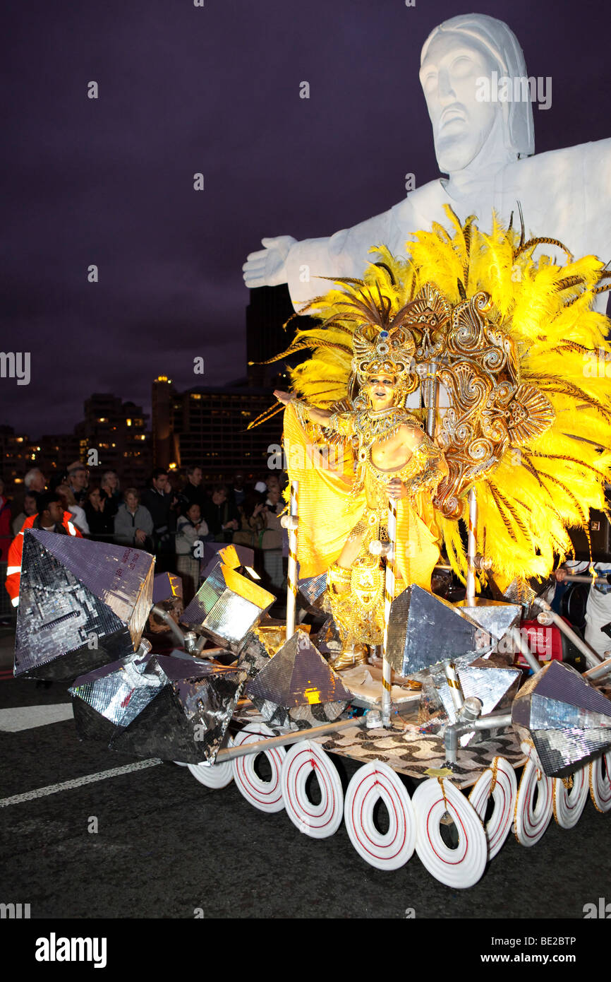 A performer on a float at The Thames Festival Night Carnival procession ...