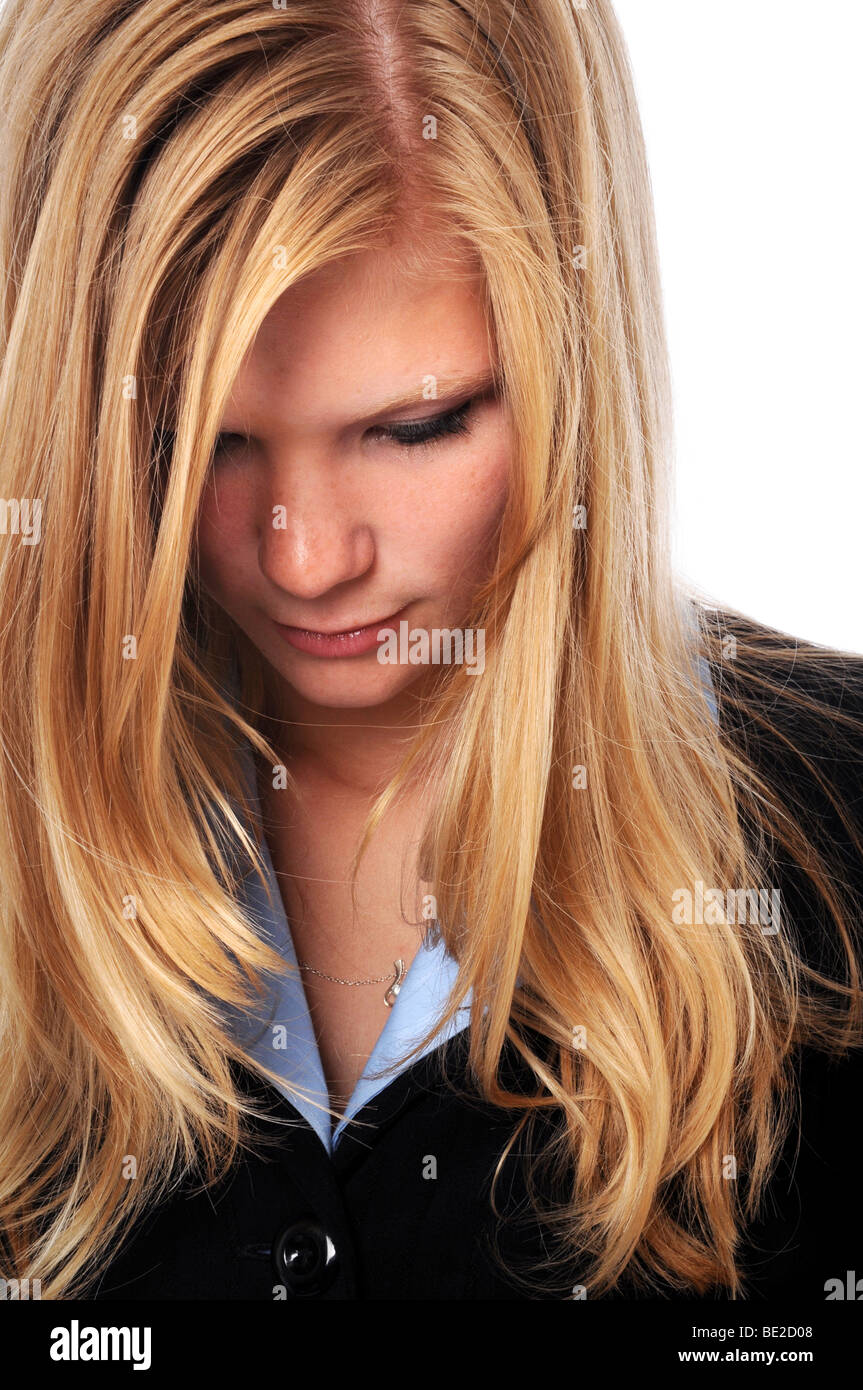 Portrait of beautiful young woman looking down Stock Photo - Alamy