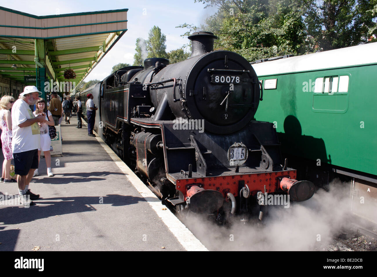 Standard 4 Tank steam locomotive at Swanage railway station Stock Photo ...