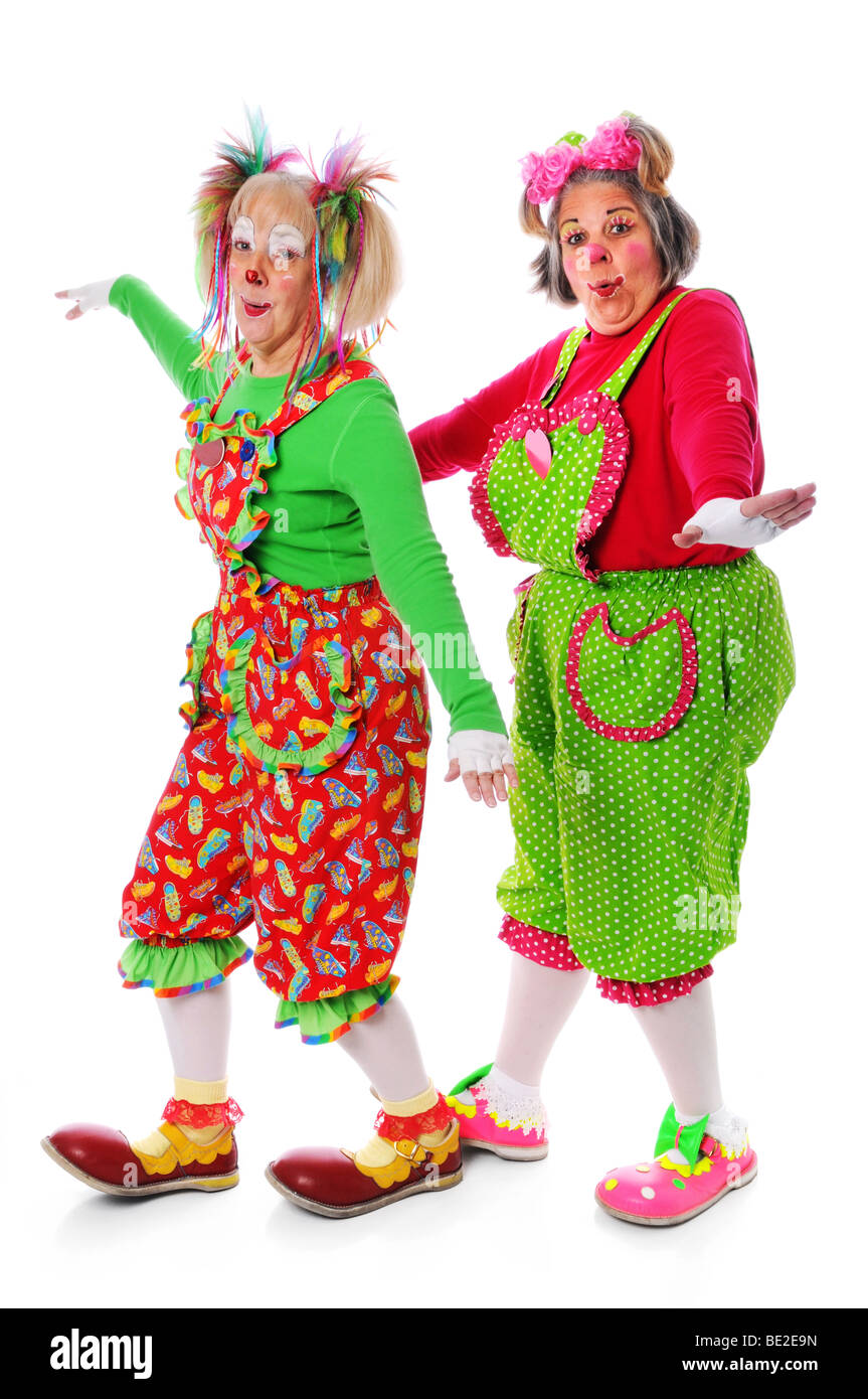 Two clowns playing isolated over a white background Stock Photo - Alamy