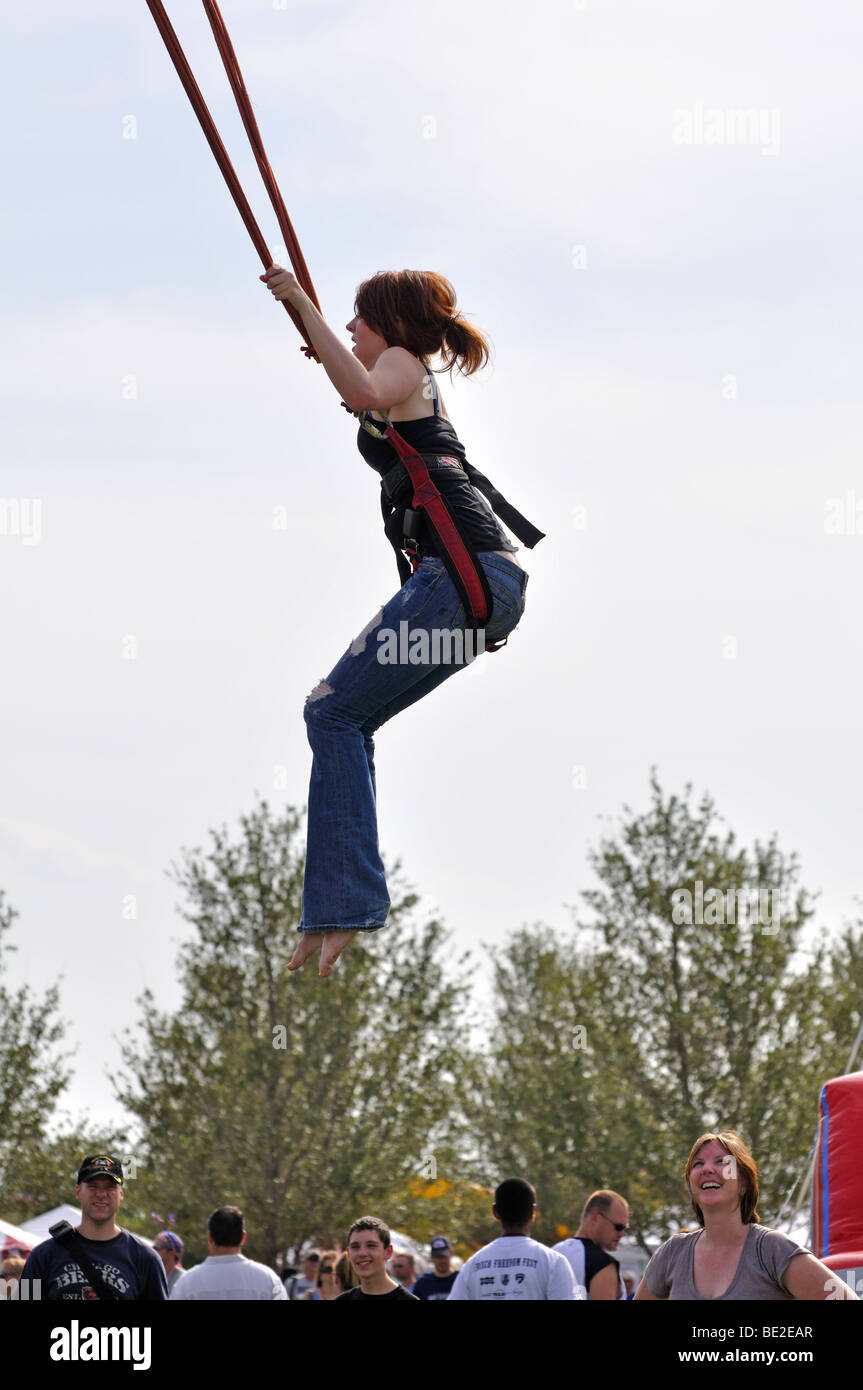 Girl enjoying Euro bungee Stock Photo - Alamy