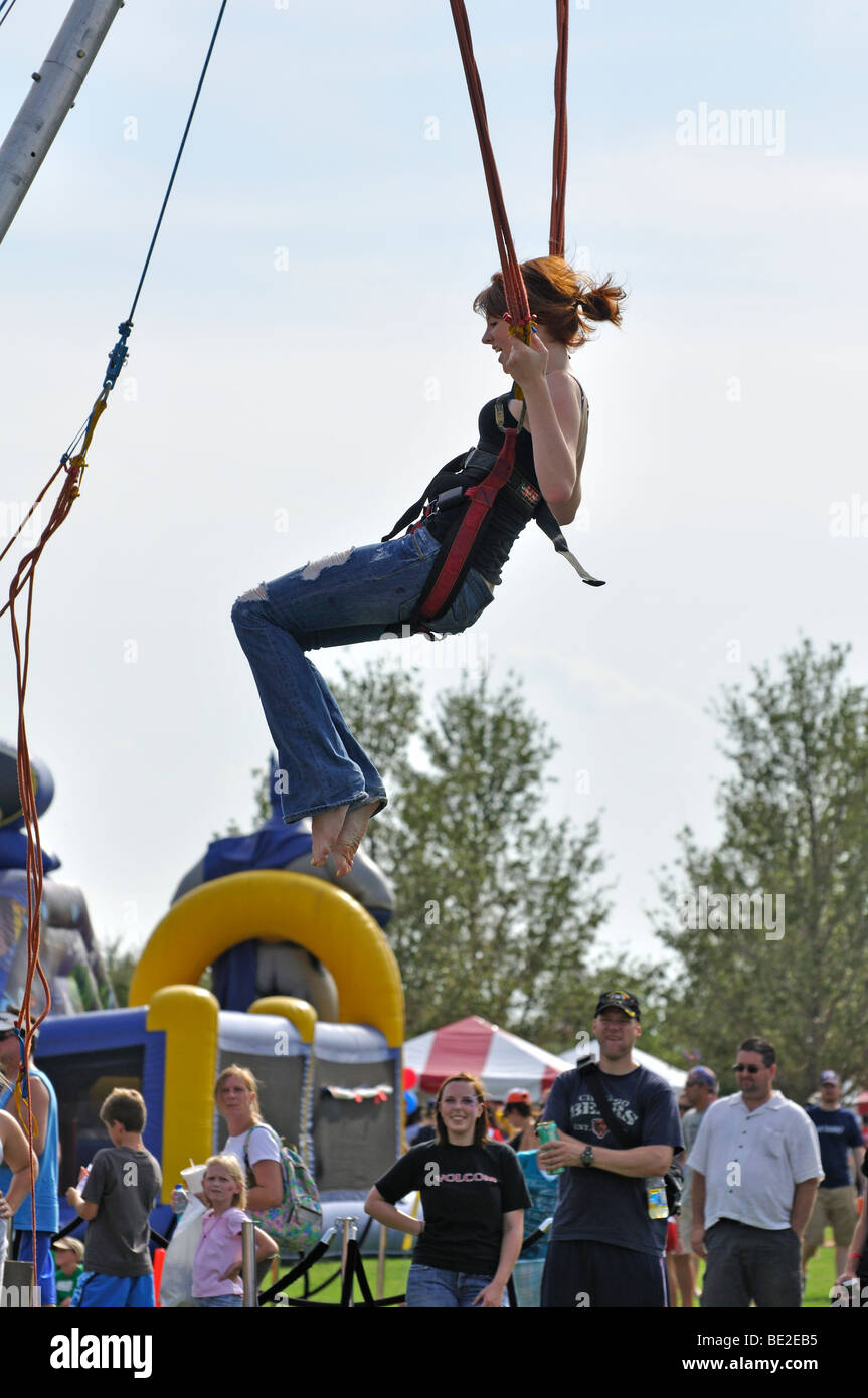 Girl enjoying Euro bungee Stock Photo - Alamy