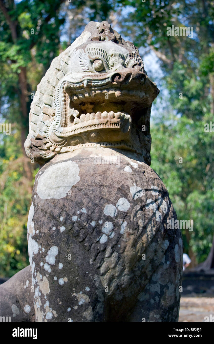 Ancient statue of lion, Ta Prohm, Temples of Angkor, Siem Reap Province ...