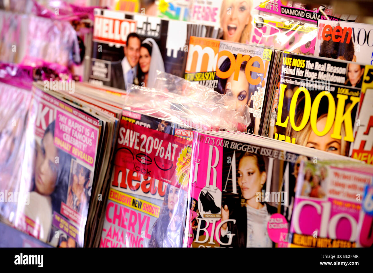 Magazines on a stand in a newsagents Stock Photo - Alamy
