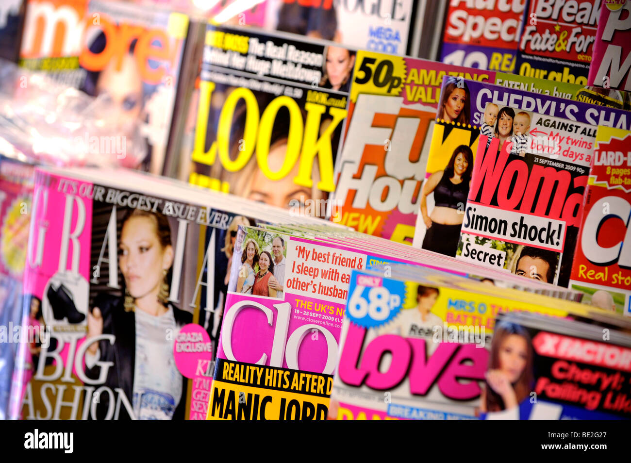 Magazines on a stand in a newsagents Stock Photo - Alamy