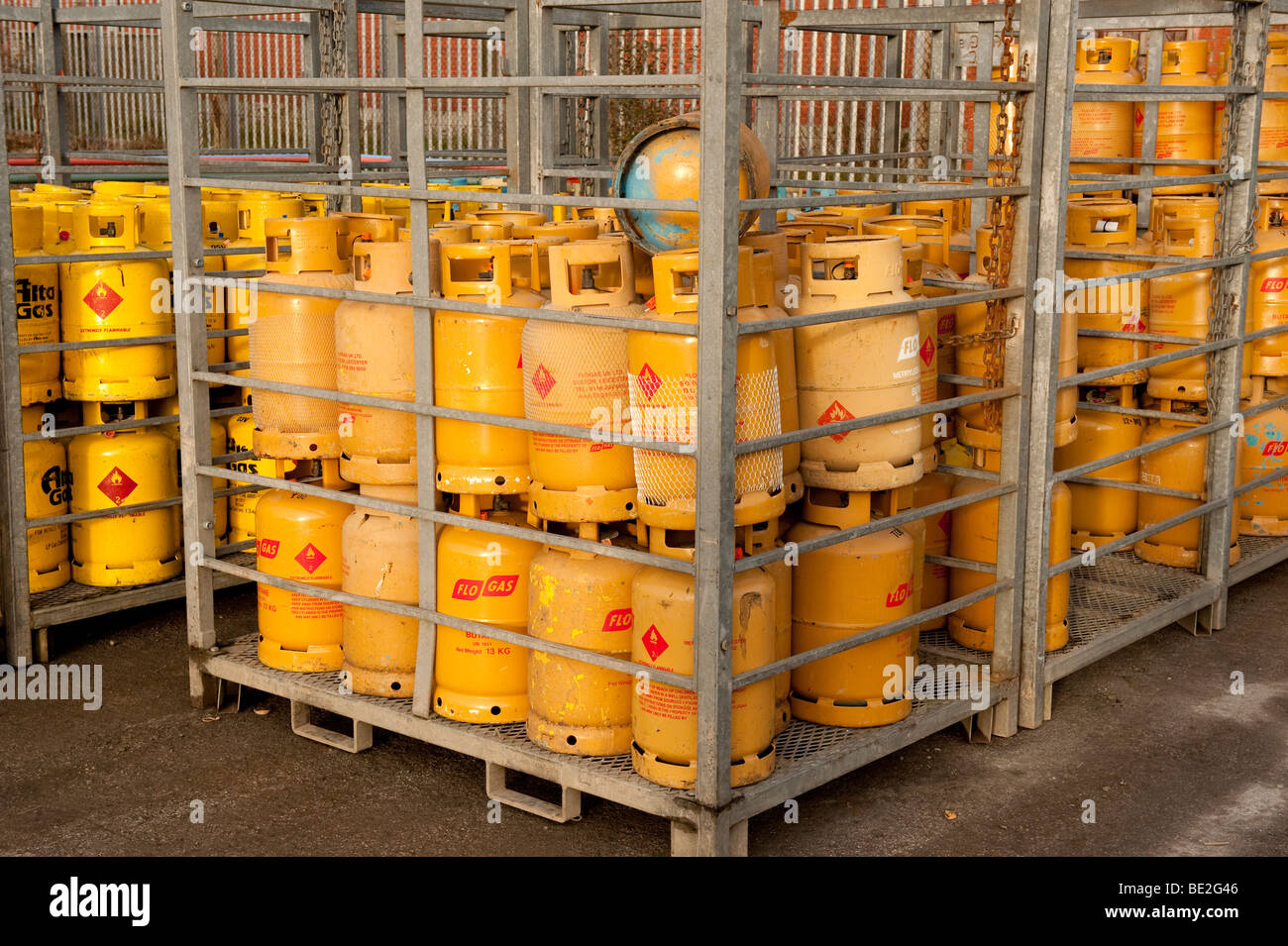 Yellow Propane and Butane Cylinders in cages Stock Photo - Alamy