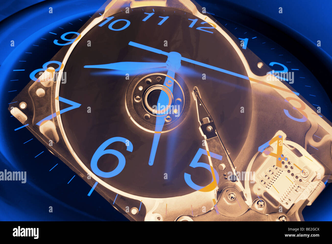 Clock and Computer Hard Disk Stock Photo - Alamy