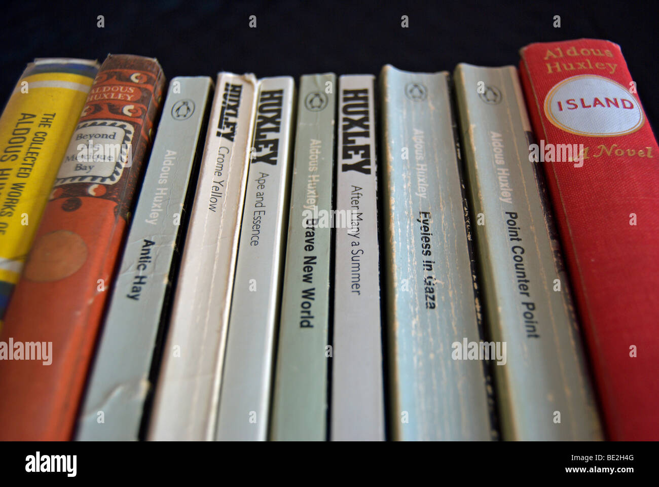 row of books by british author aldous huxley, including his best known ...