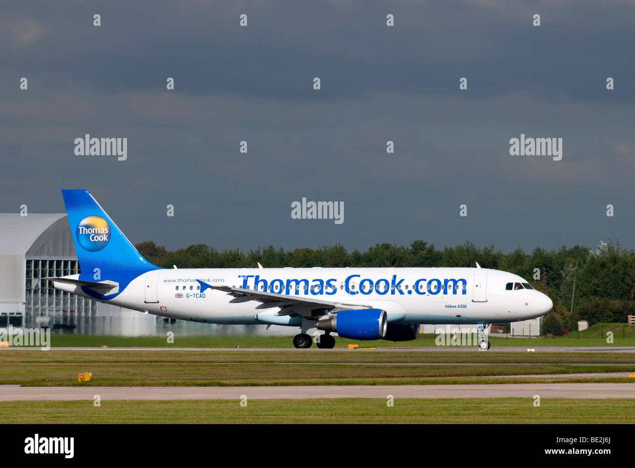Thomas Cook aircraft preparing for take off from Manchester Airport ...