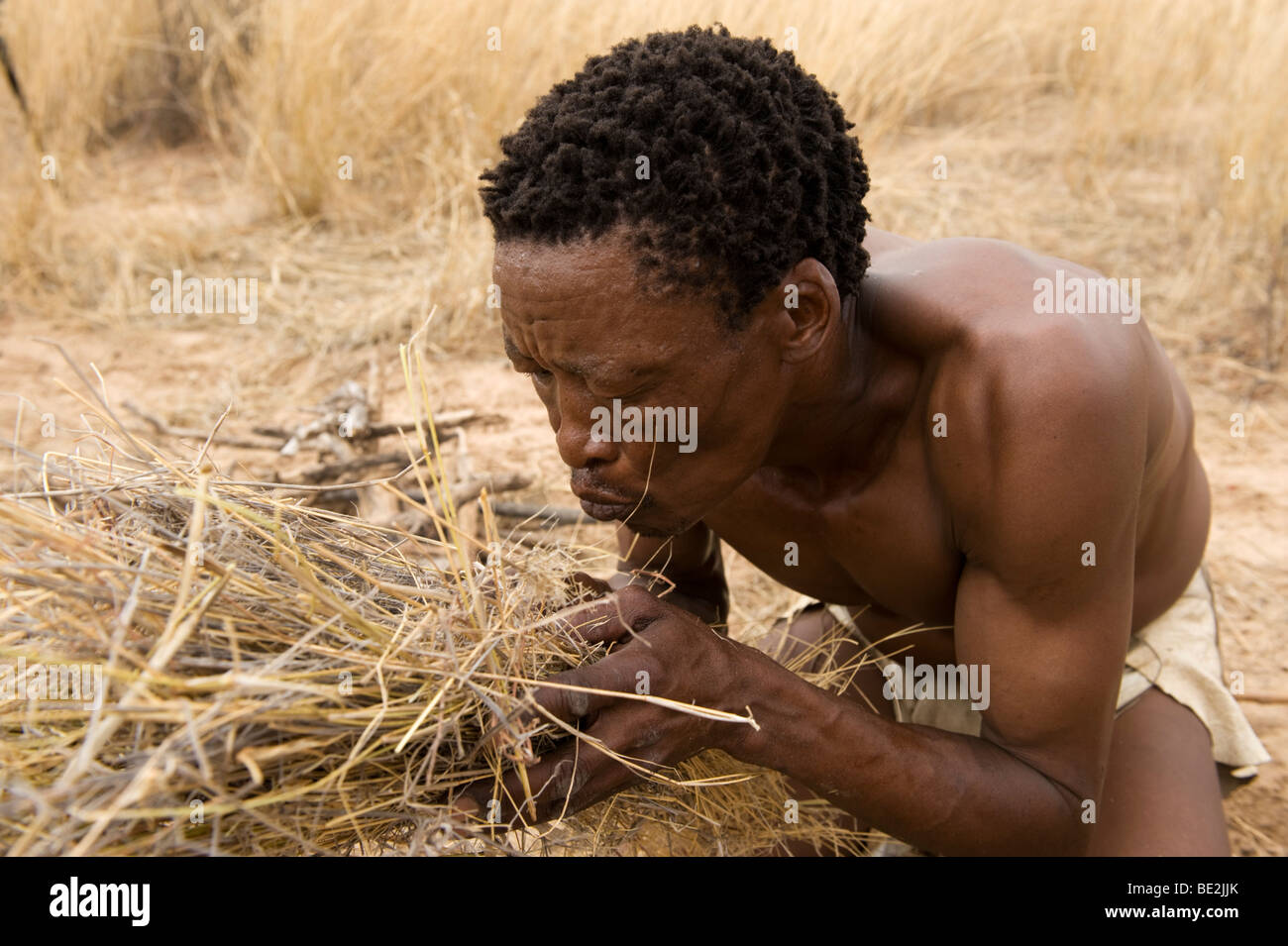 Bushman making fire hi-res stock photography and images - Alamy