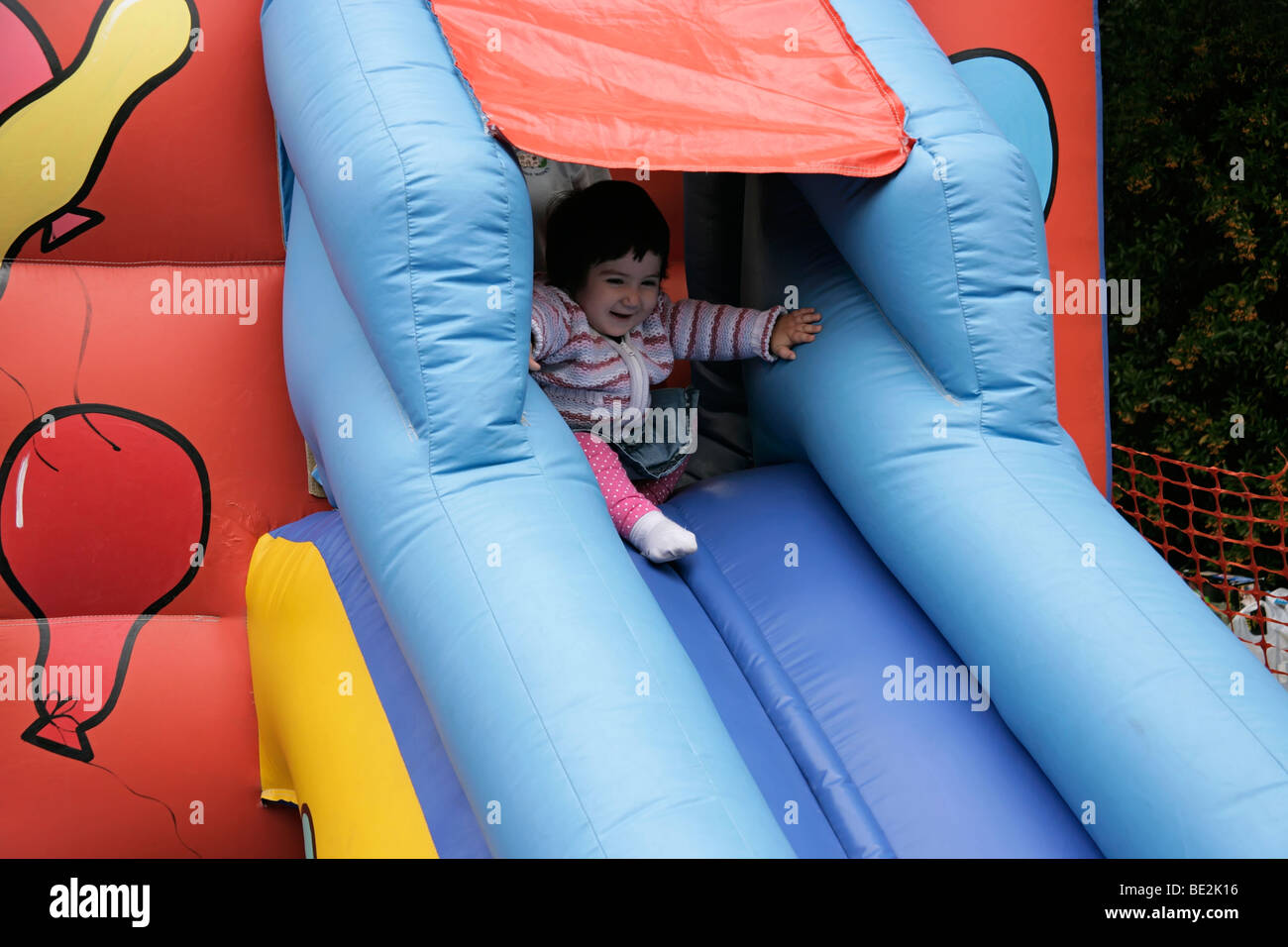 Going down the slide hi-res stock photography and images - Alamy