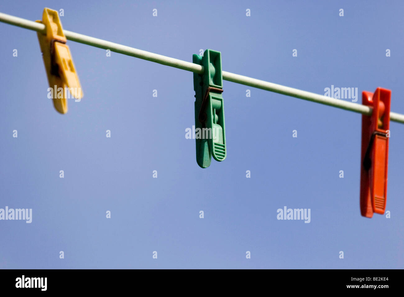Pegs on a washing line Stock Photo - Alamy