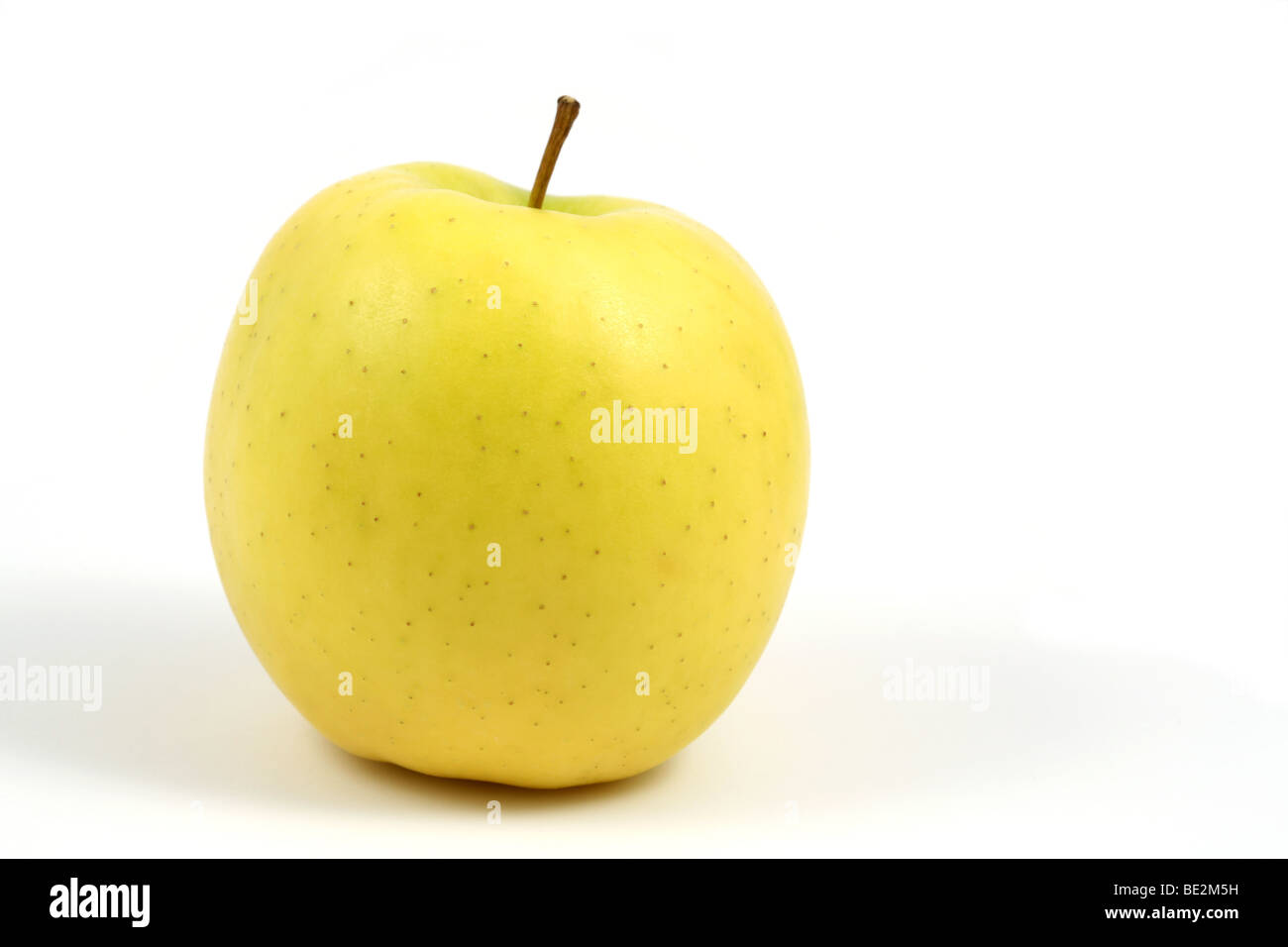 Yellow apple isolated on a white background Stock Photo - Alamy