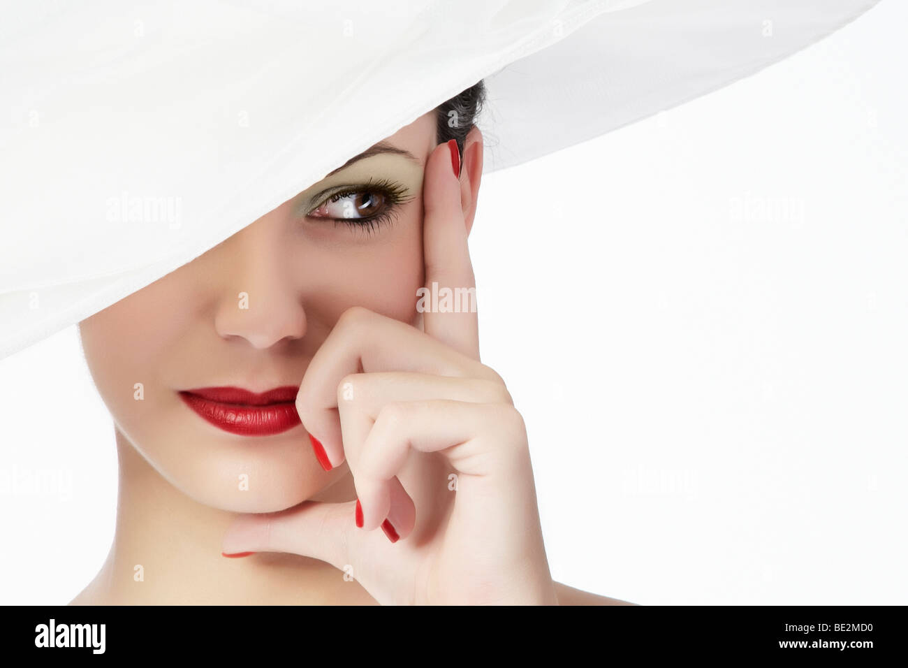 Hand resting on cheek hi-res stock photography and images - Alamy