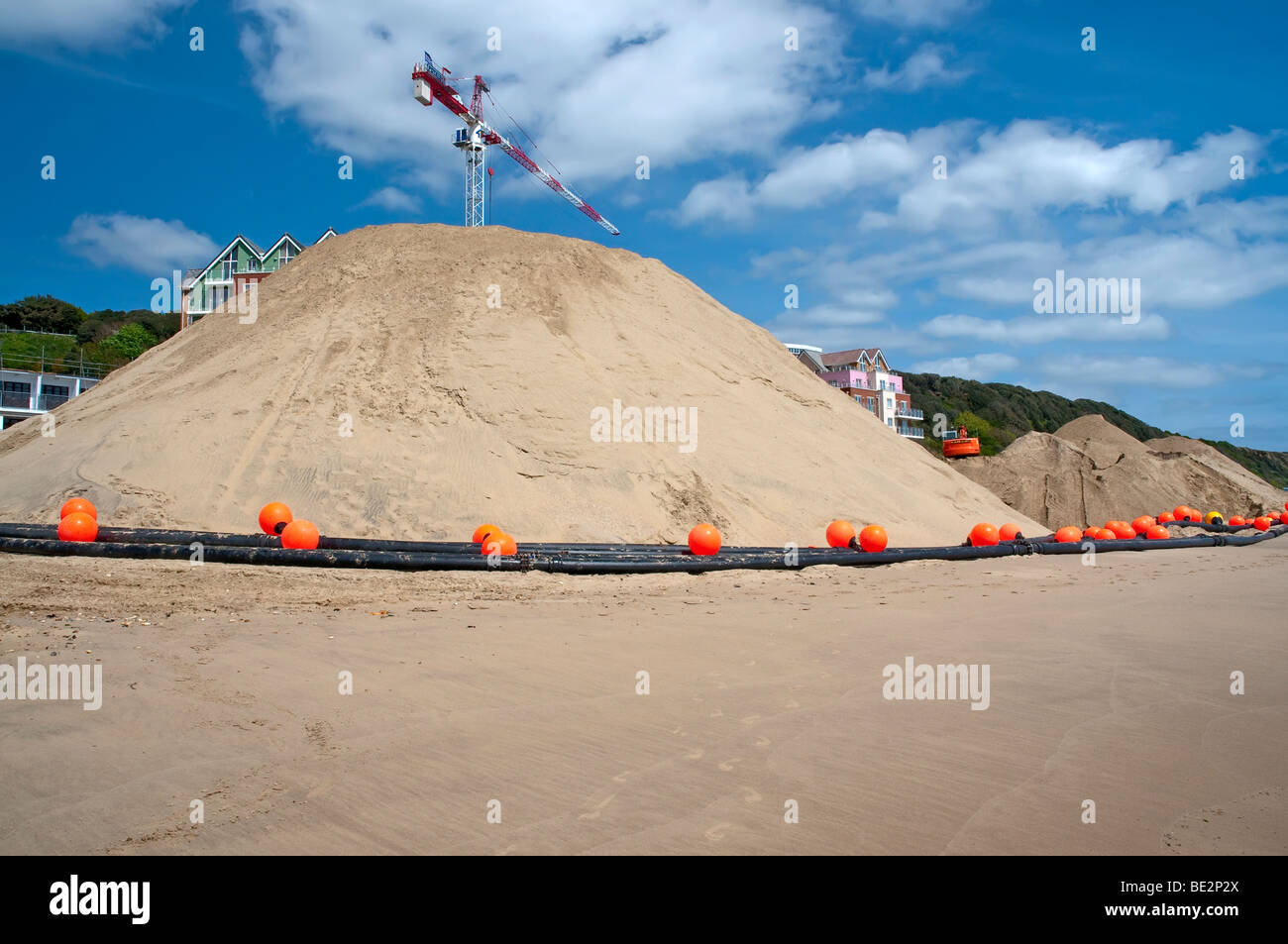 Piles of sand on Boscombe beach which will be used to make the ...