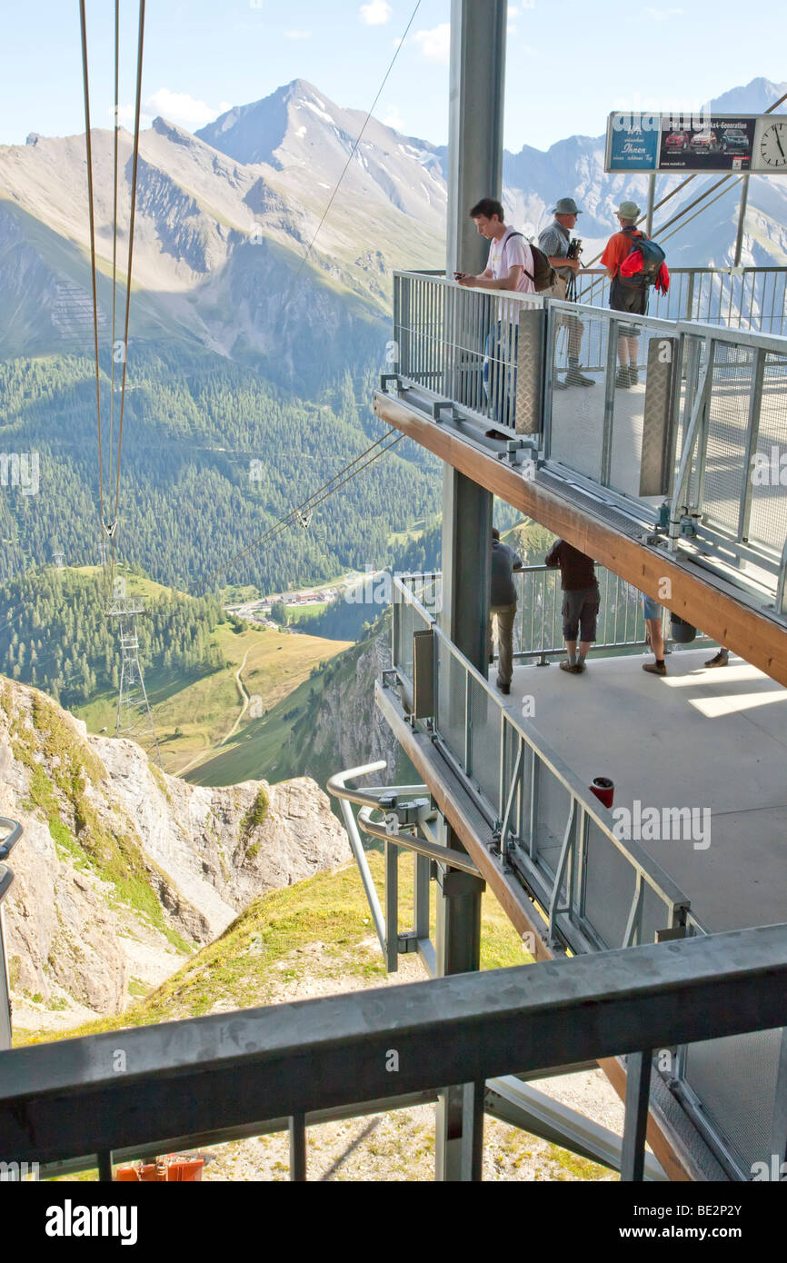 Tourists at a funicular station in Samnaun, Switzerland, enjoying the ...