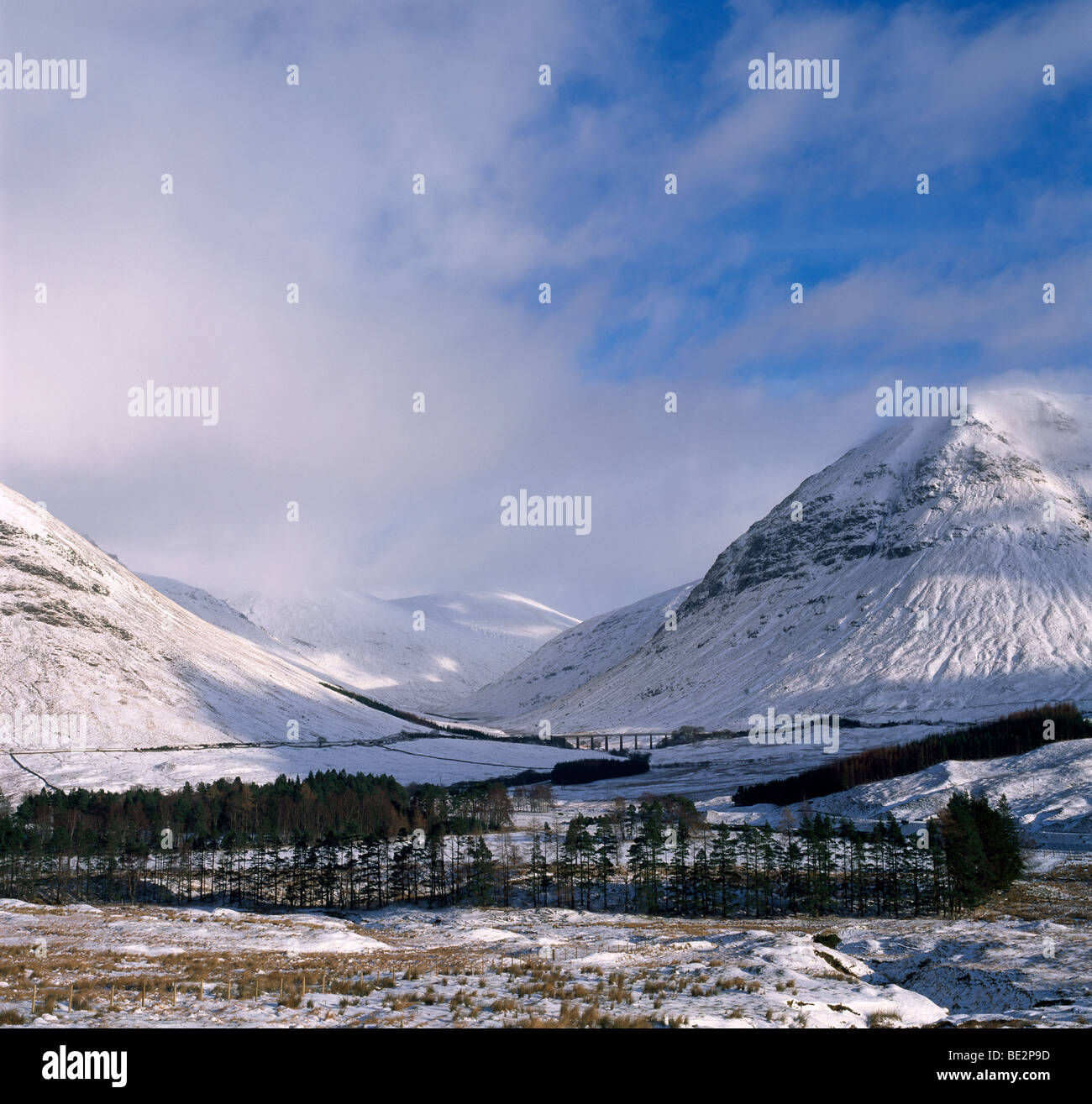 View east from A82, north of Tyndrum, along Auch Gleann with Beinn A ...