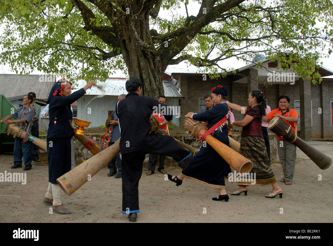 Ethnology, Phunoi musicians playing drums and dancing, Pi Mai, Lao New ...