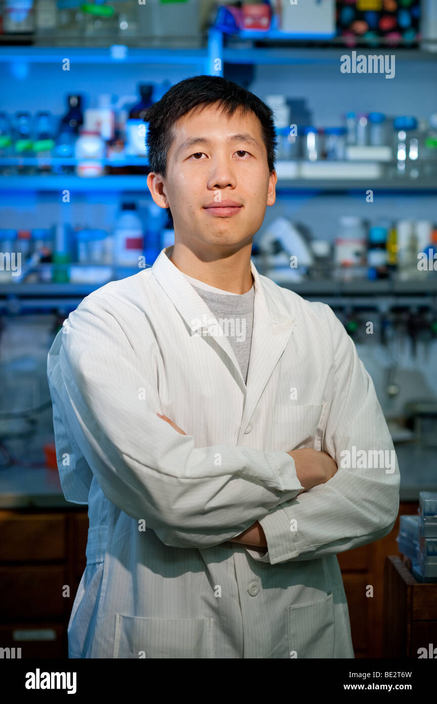 An Asian male research Scientist poses for a portrait in his laboratory ...
