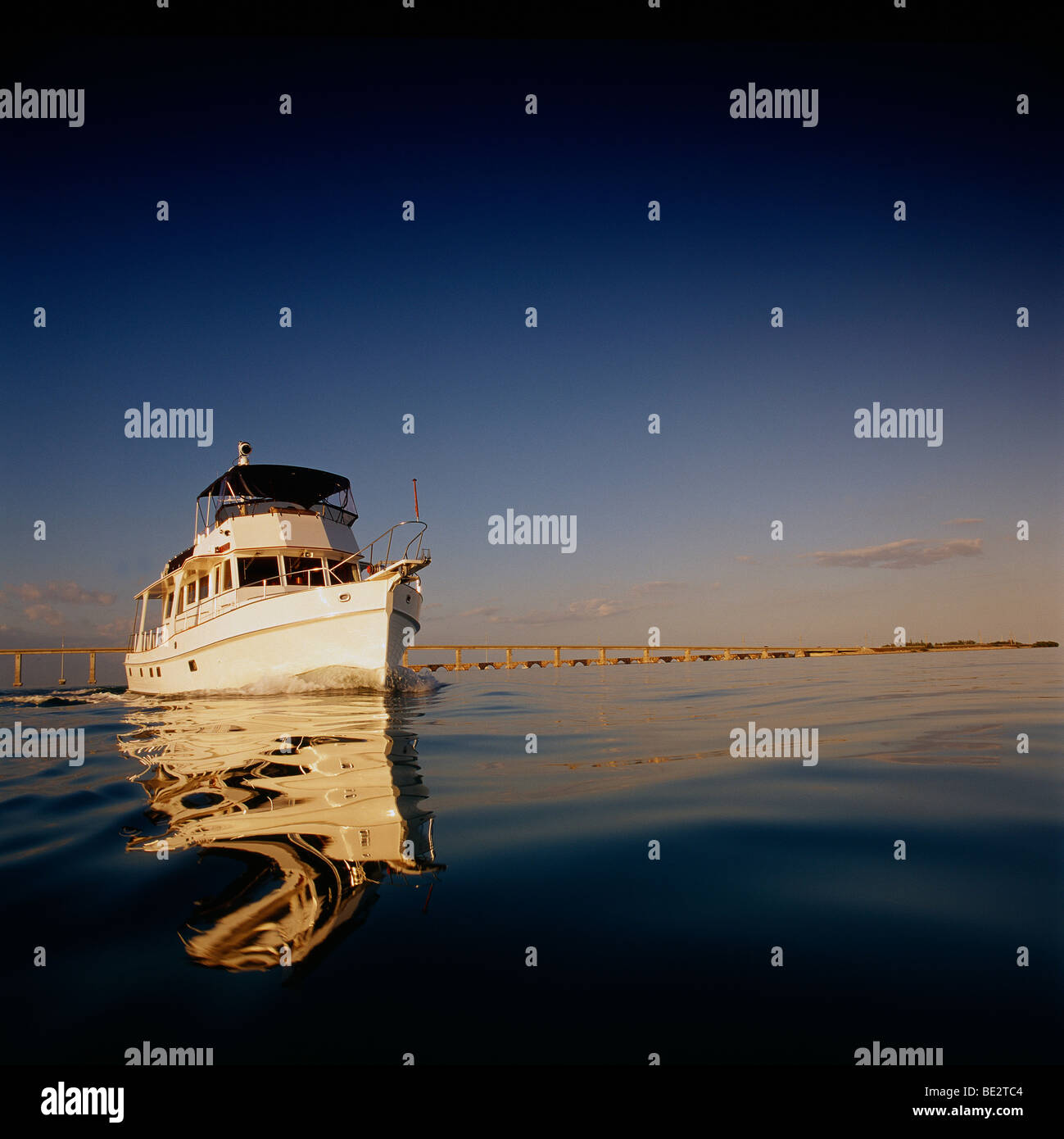 Motor yacht with refection Stock Photo - Alamy