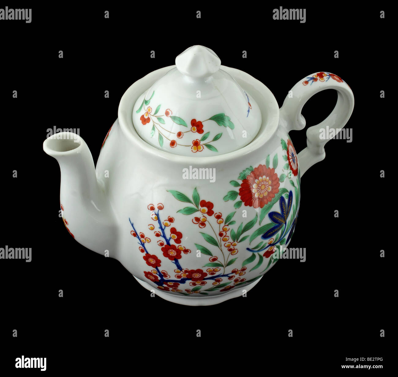 Colorful old floral design teapot Stock Photo - Alamy