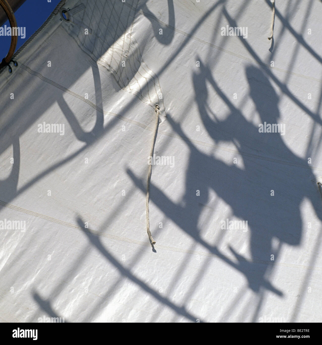 Shadow of sailor in rigging Stock Photo - Alamy