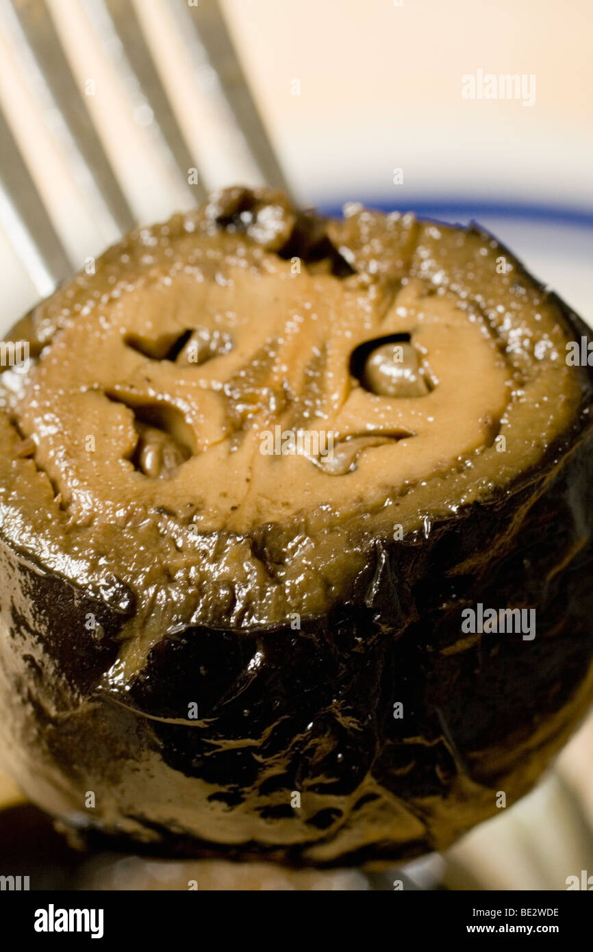 A sliced pickled walnut Stock Photo - Alamy