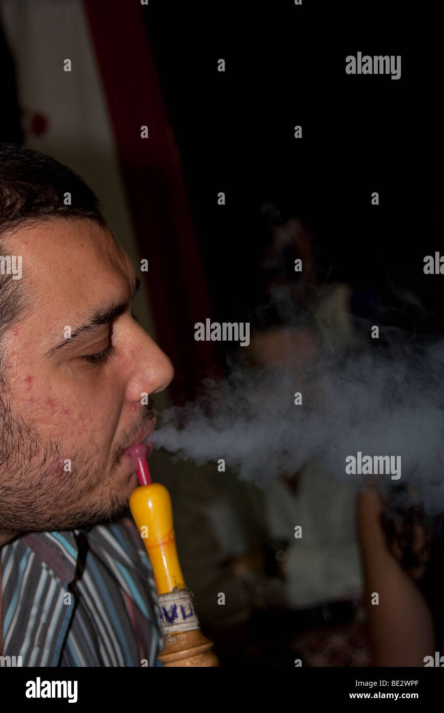 Arab man smoking shisha hi-res stock photography and images - Alamy