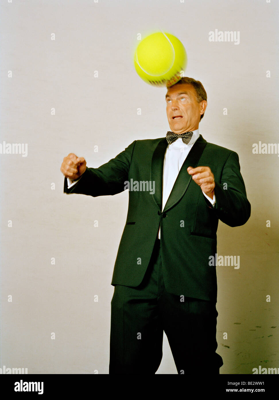 Trevor Brooking heads giant tennis ball Stock Photo - Alamy