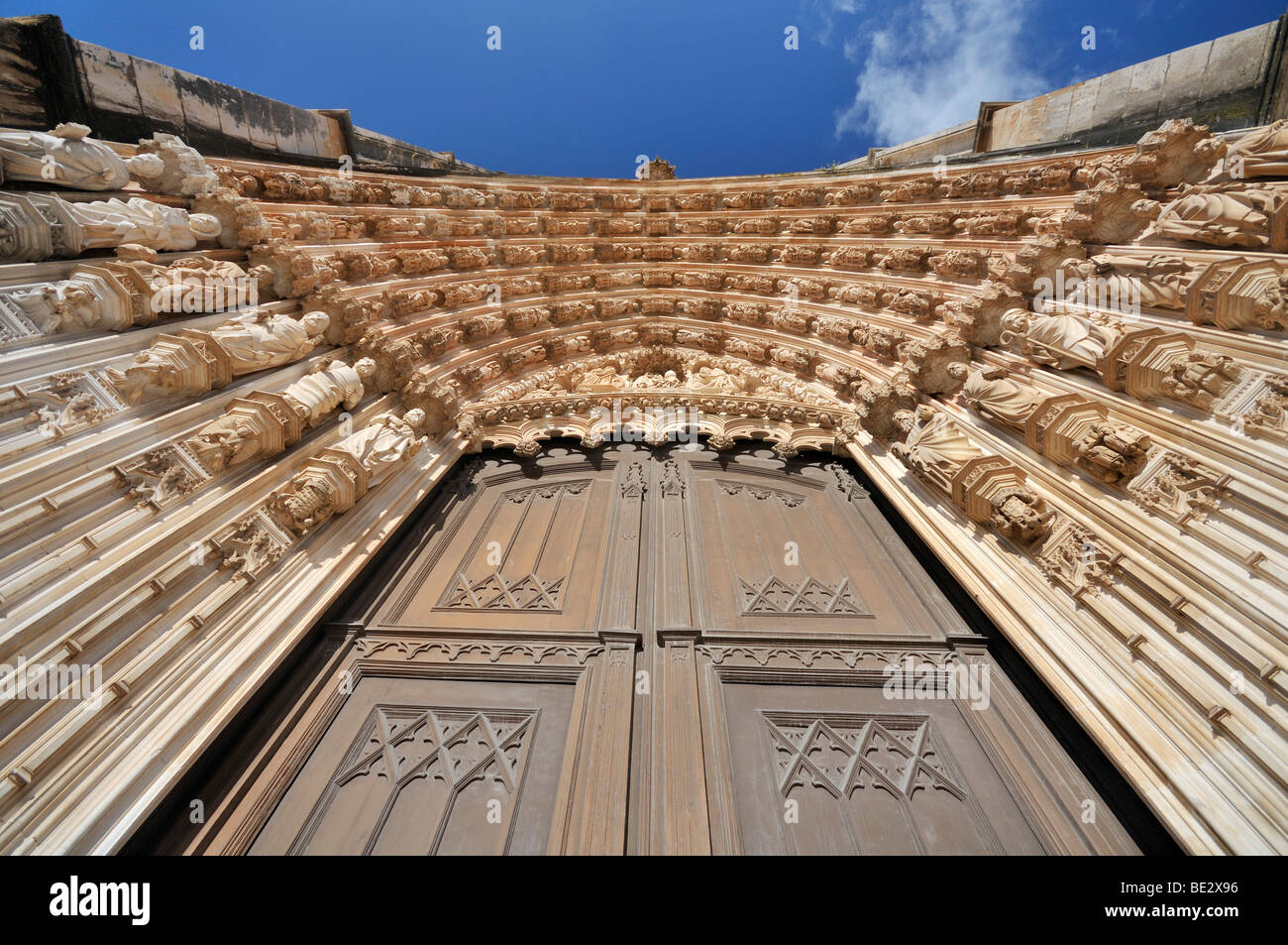 Gothic portal of the basilica, Dominican monastery Mosteiro de Santa ...