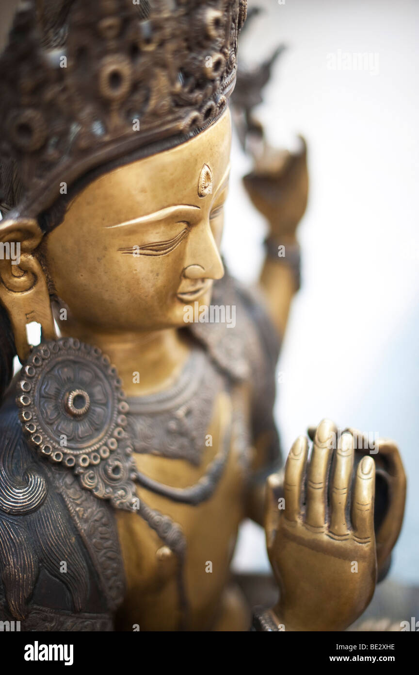 Buddhist deity statue Stock Photo - Alamy