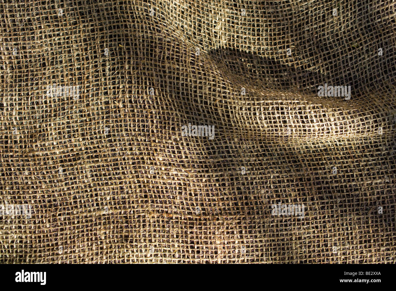 Burlap in sunlight Stock Photo - Alamy