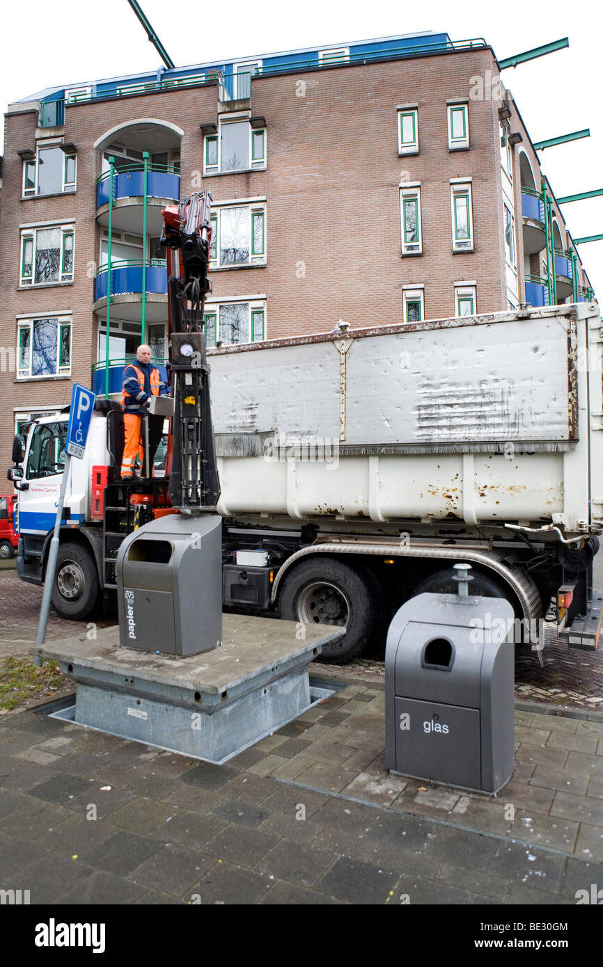 Recycling of paper collected in underground disposal points. All ...