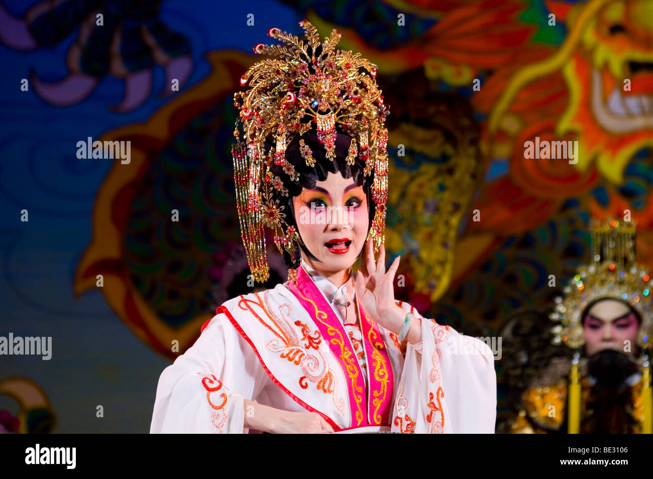 Chinese opera - actress performing song, colorful costume and strong ...