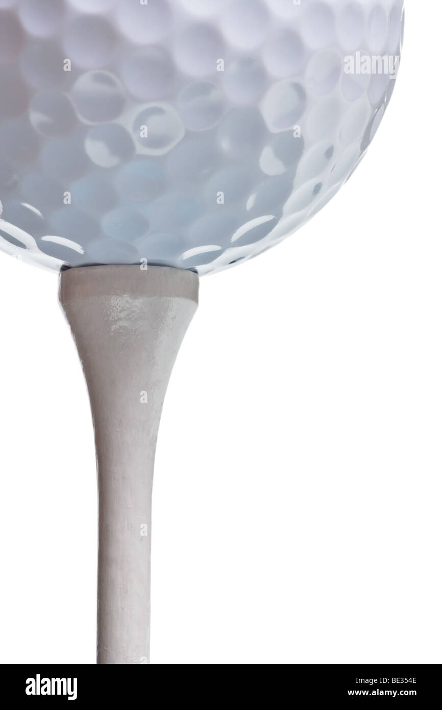 golf ball on tee isolated on white Stock Photo - Alamy