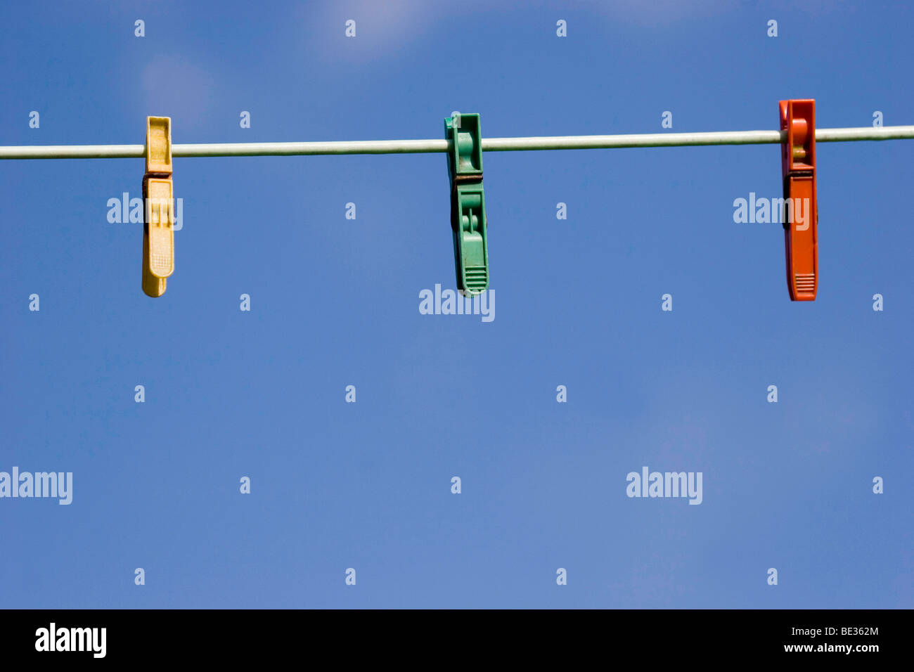 pegs on a washing line Stock Photo - Alamy