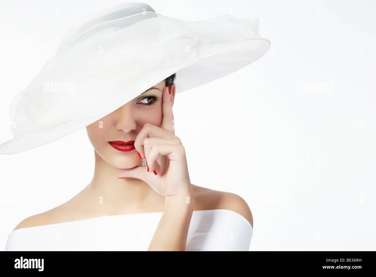 Female hand resting on cheek hi-res stock photography and images - Alamy