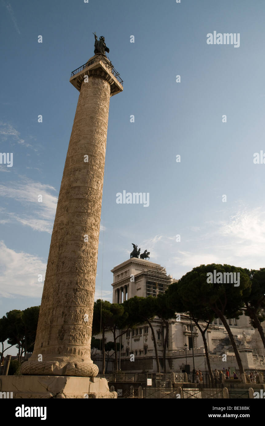 Trajan's Column in Rome with Monument to Vittorio Emanuele II at the ...