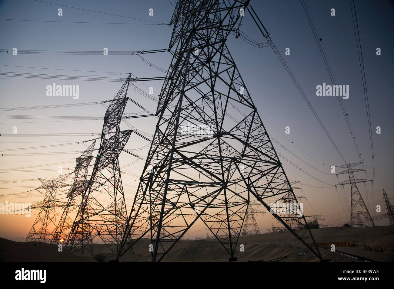 Transmission lines towers tower pylon power line Stock Photo - Alamy