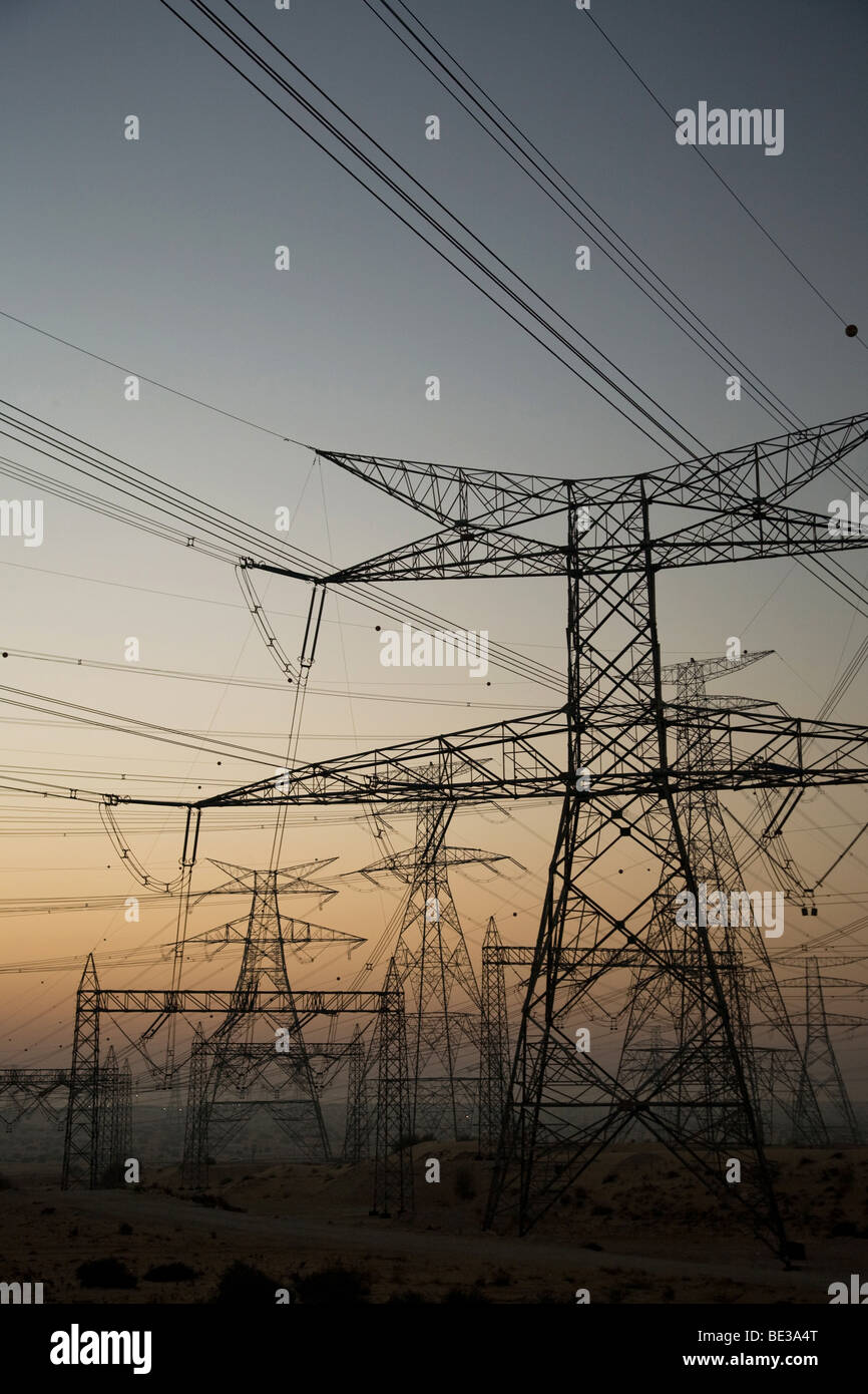 Transmission lines towers tower pylon power line Stock Photo - Alamy