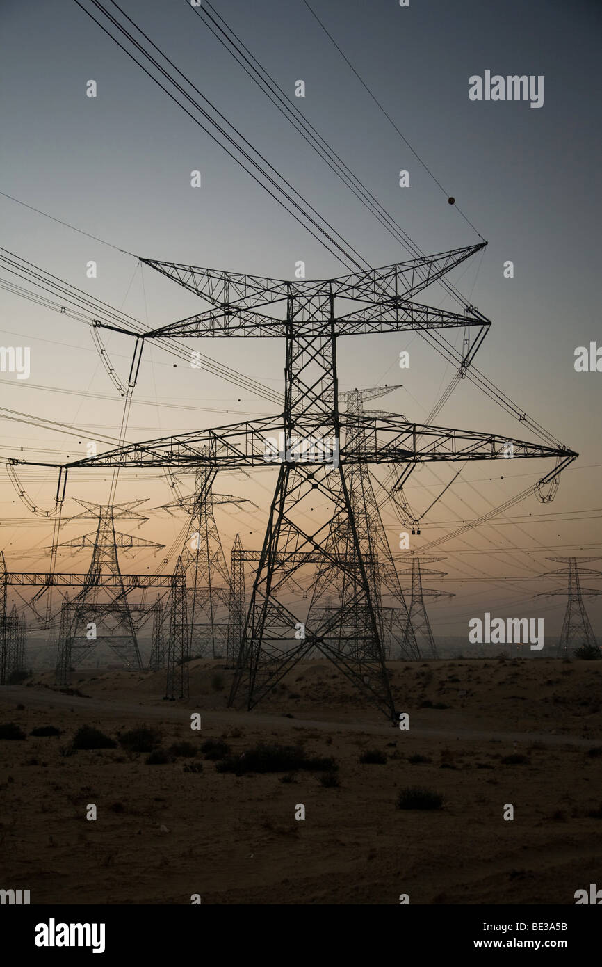 Transmission lines towers tower pylon power line Stock Photo - Alamy