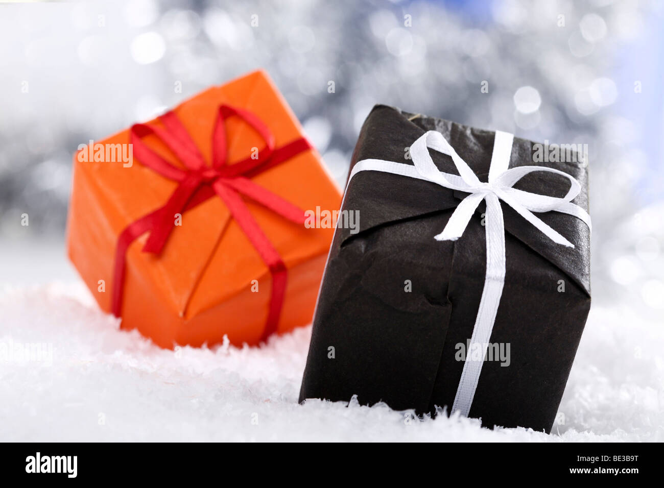 Presents on snow Stock Photo - Alamy