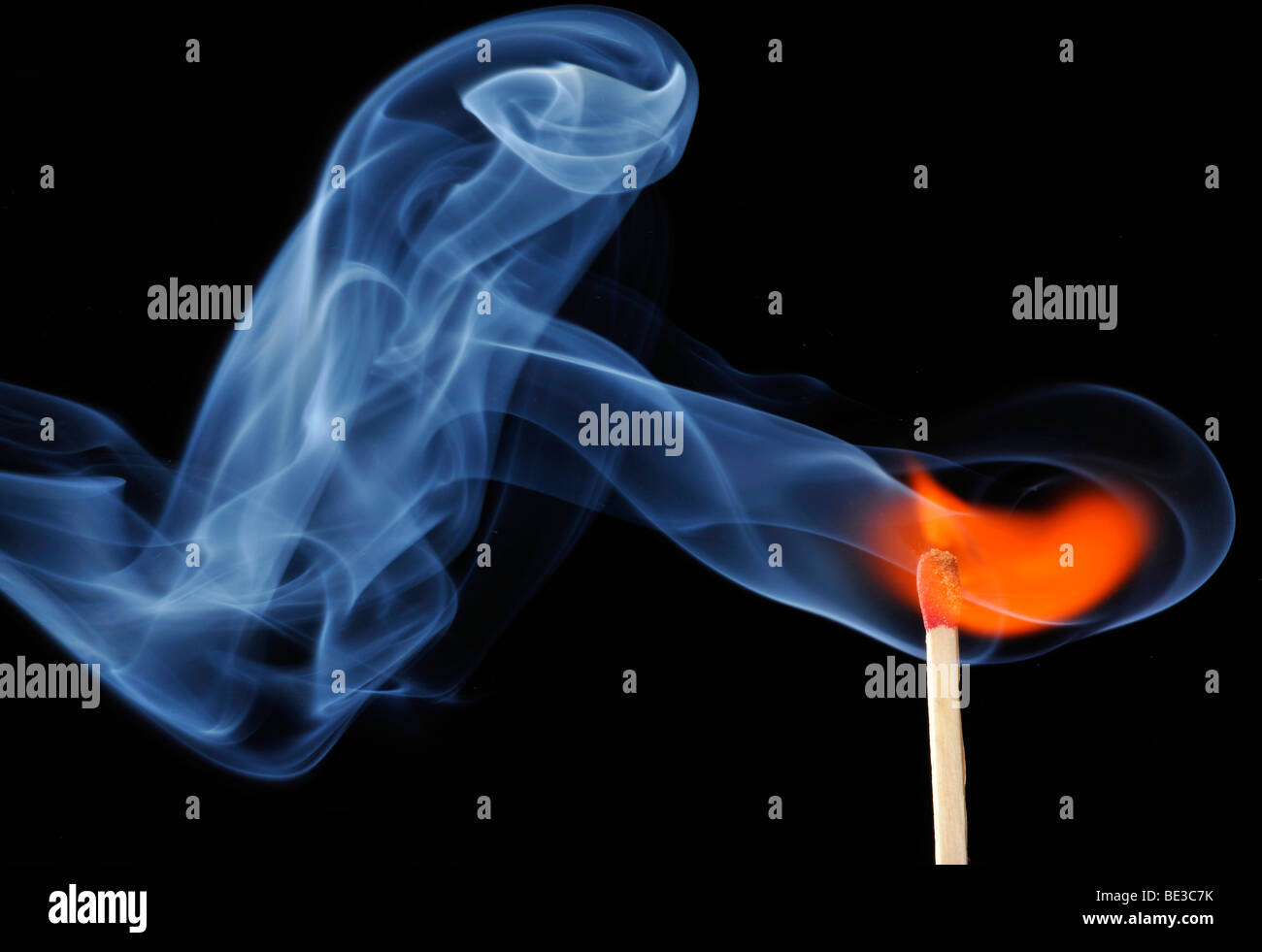 Lit match, flame, blue smoke Stock Photo - Alamy