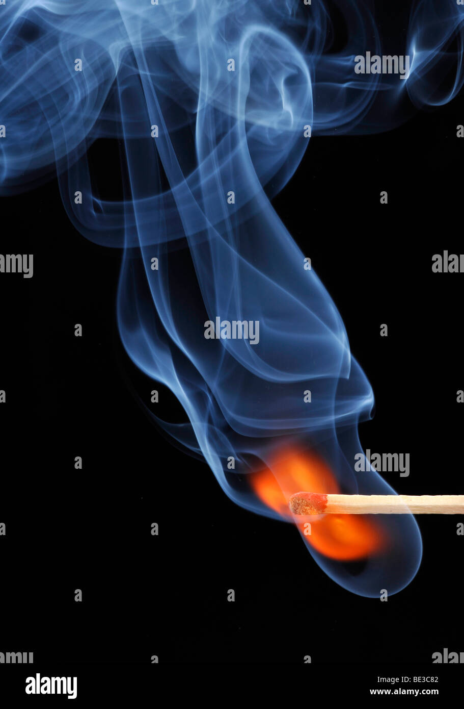 Lit match, flame, blue smoke Stock Photo - Alamy