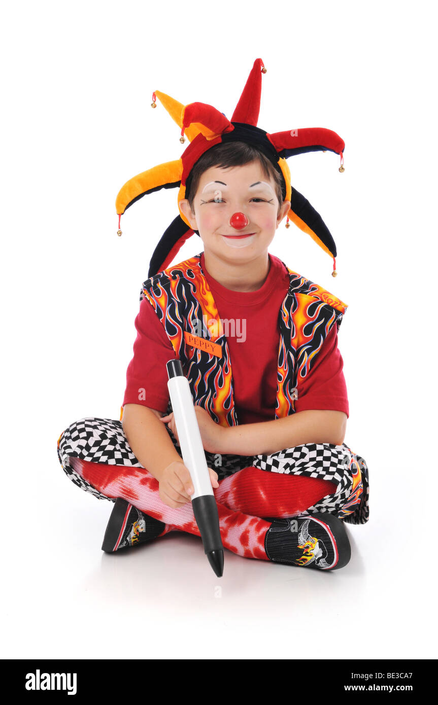 Clown boy holding a pen isolated on a white background Stock Photo - Alamy