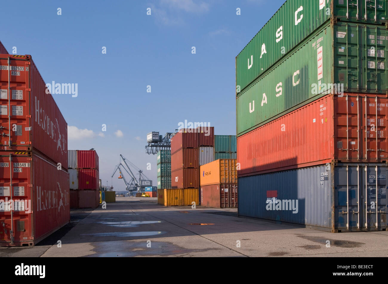 Bonn harbour, overlooking the terminal, cranes in the back, stacked ...