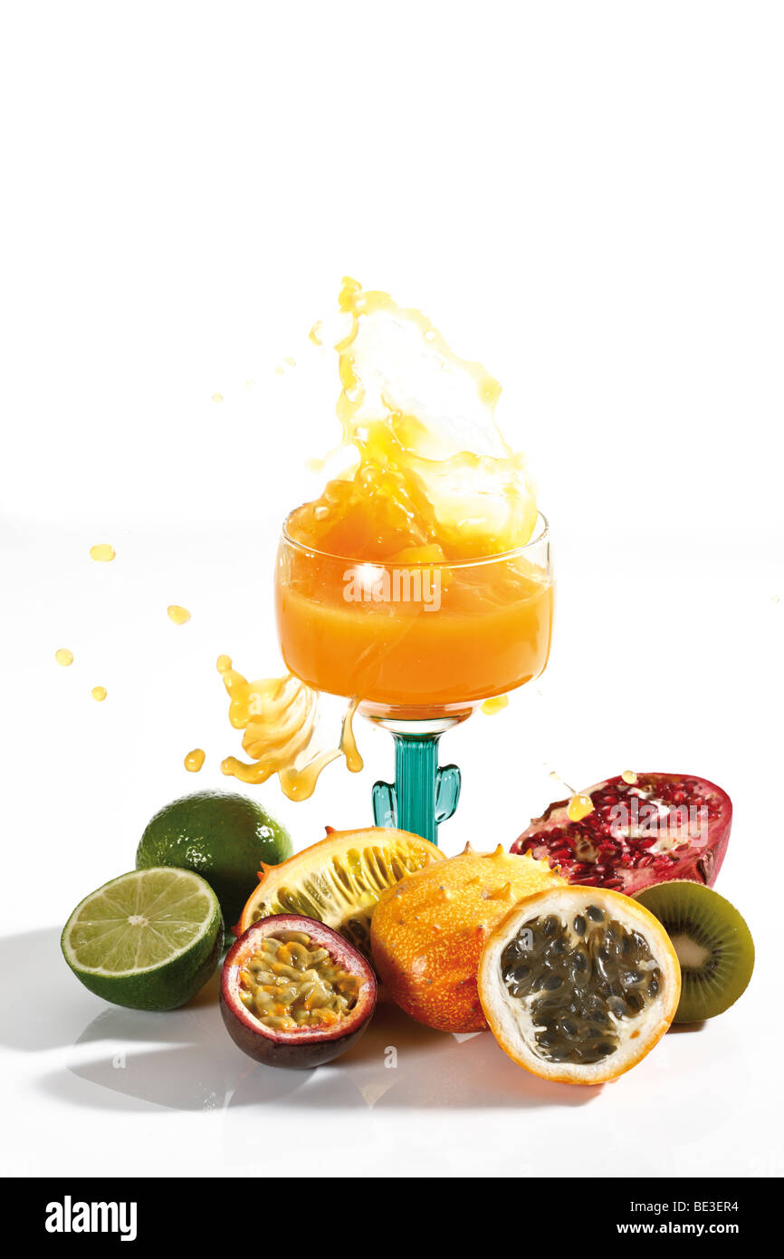 Exotic fruits and splashing fruit juice Stock Photo - Alamy