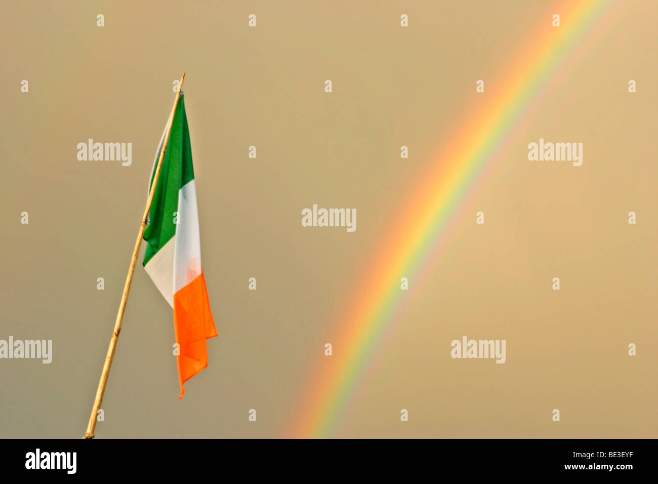 rainbow beside the Irish Flag Stock Photo - Alamy