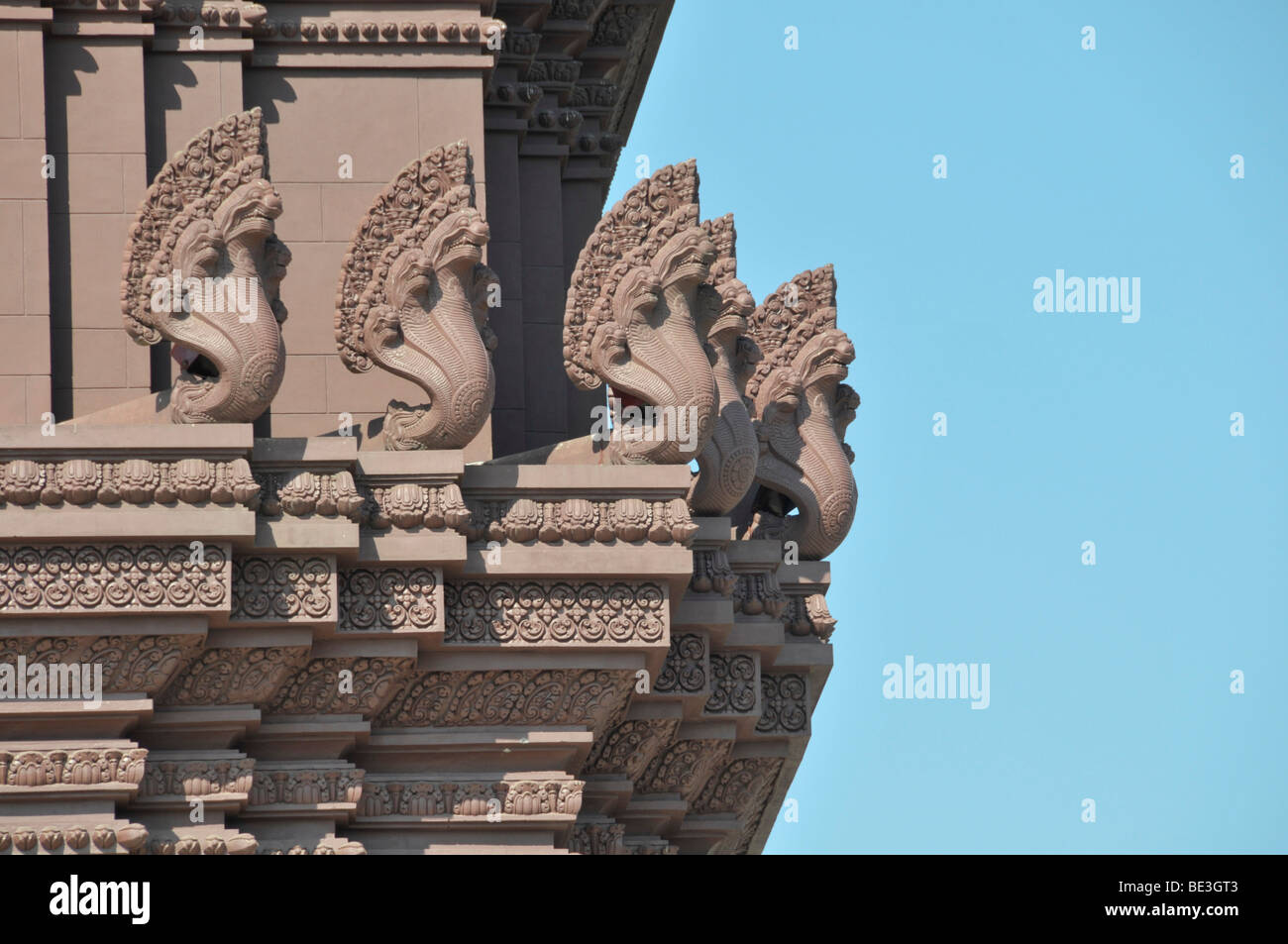 Naga snakes made of red sandstone on the Independence Monument, in ...