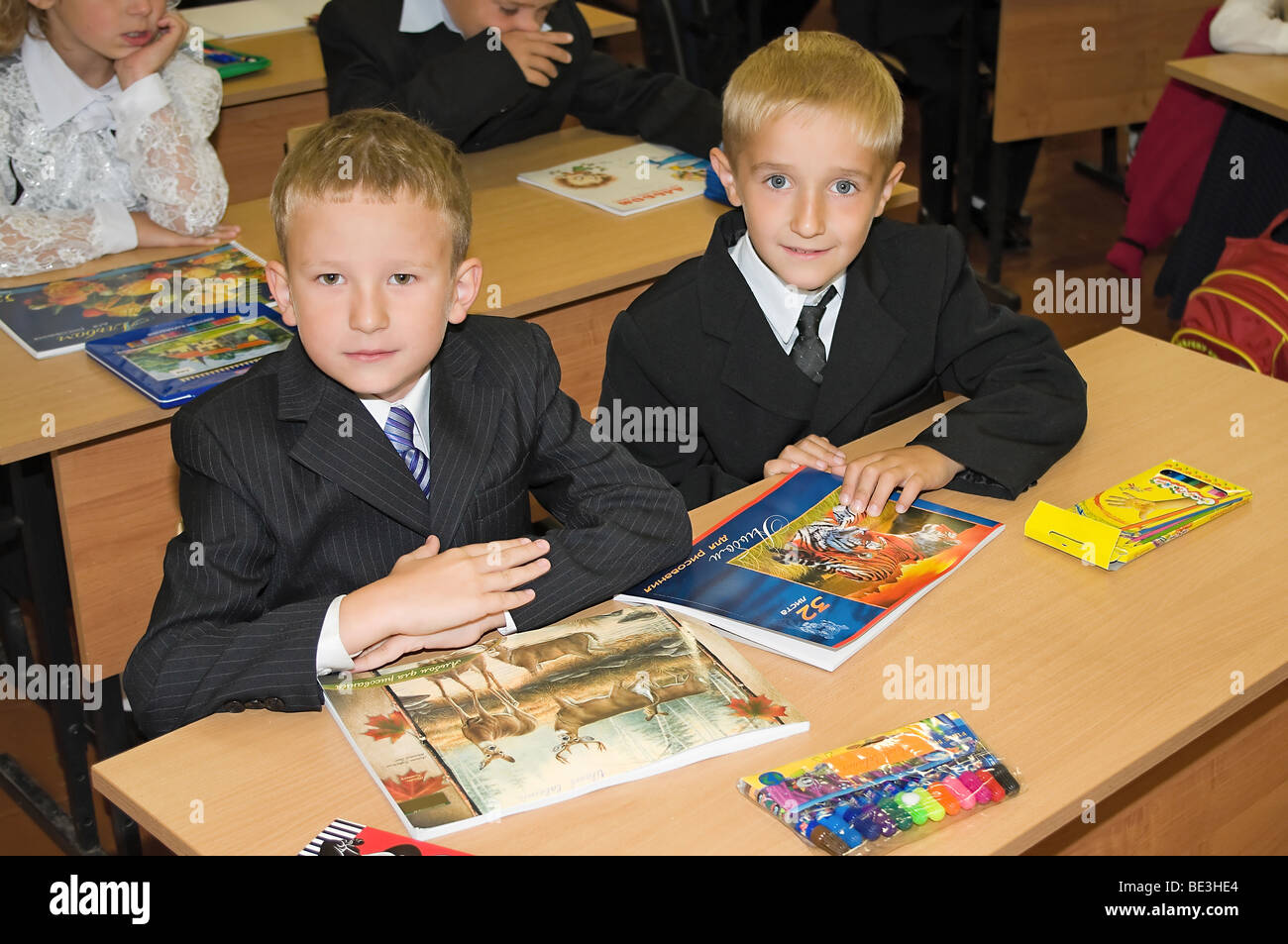 Russian boys Caucasians students are sitting on the lesson in classroom ...